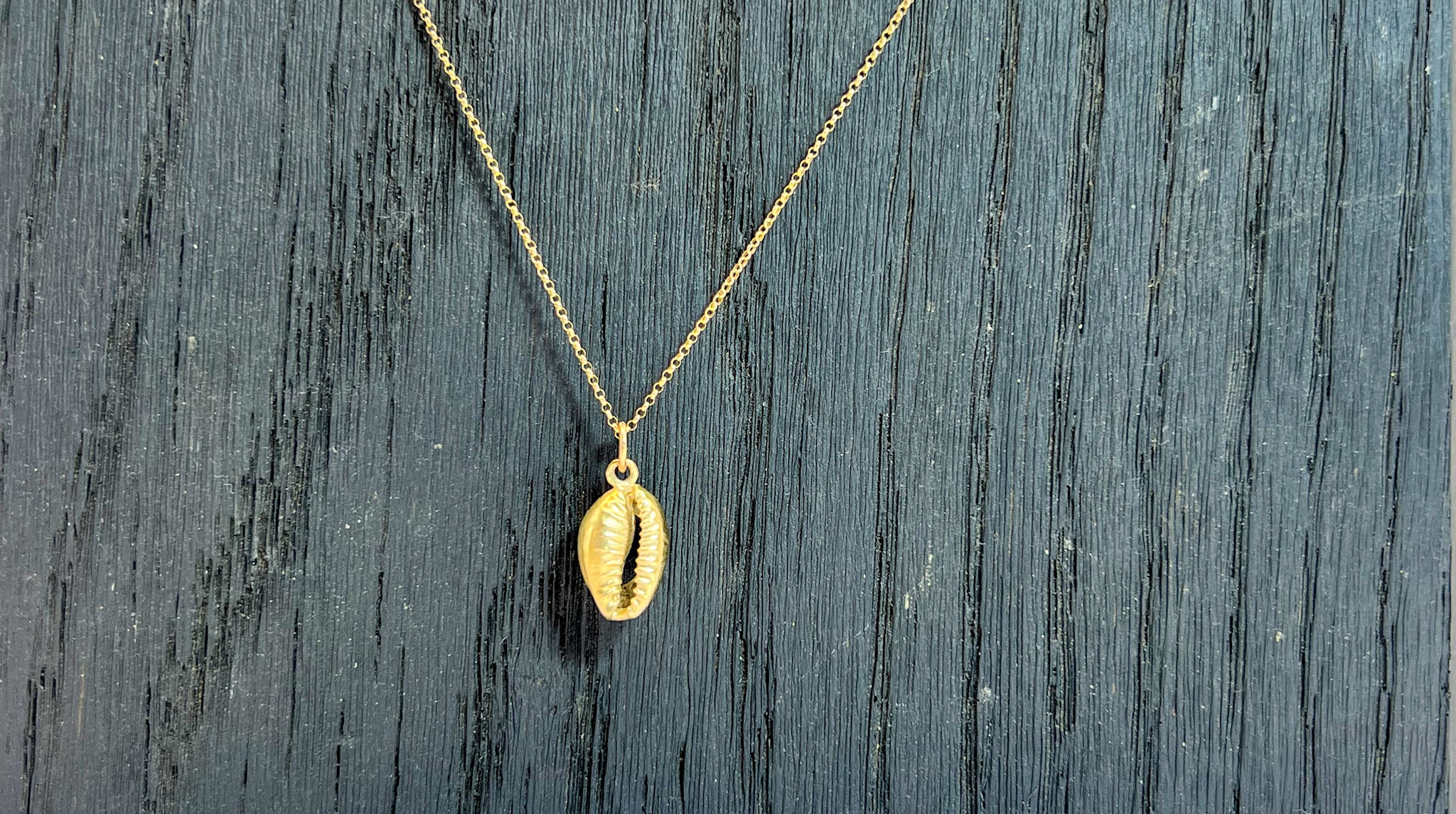 14k gold cowrie shell pendant store